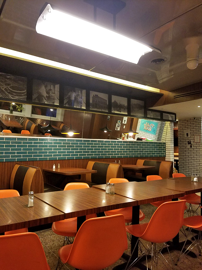 Evening transforms the dining room into a warm sanctuary of comfort food possibilities, where vintage photographs tell stories while you create new ones.