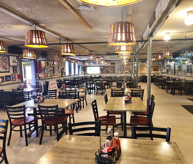 The dining room balances no-nonsense functionality with old Florida charm&mdash;those basket lampshades have witnessed countless crab-cracking victories.