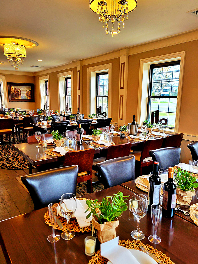 Golden light bathes tables set for celebration&mdash;this isn't just dinner, it's an occasion waiting for you to arrive.