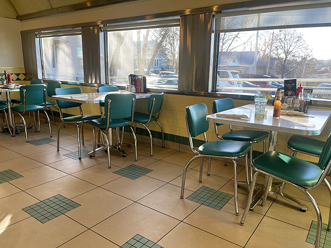 Sun streams through large windows, illuminating the dining area where countless Wisconsin stories have been shared over countless cups of coffee.