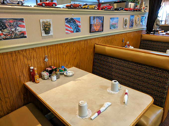 Booths designed for comfort and conversation, where coffee refills and life stories flow with equal abundance.