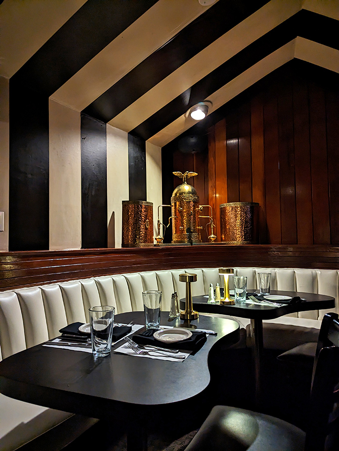 Black and white striped ceilings hover above cream-colored booths&mdash;the dining room equivalent of formal wear with permission to loosen your tie.