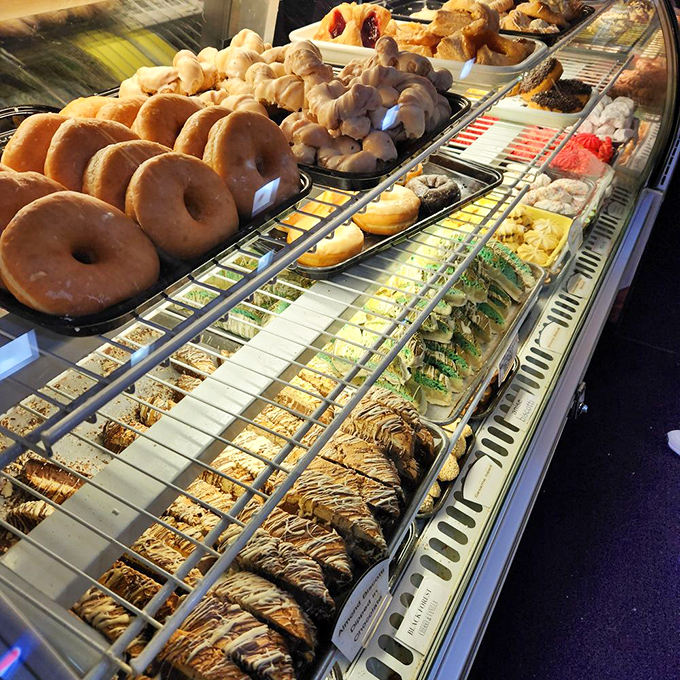 The pastry case stretches like a runway where each model&mdash;from cream-filled donuts to chocolate-dipped delights&mdash;competes for your attention.