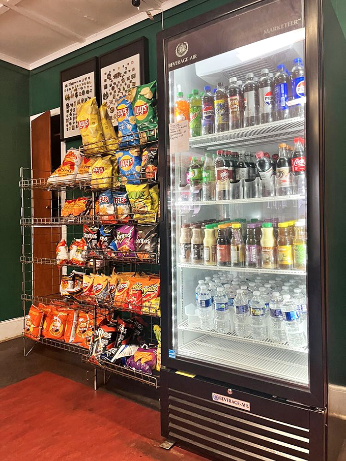 The wall of temptation&mdash;where chips and cold beverages stand ready to complete your sandwich experience with that perfect crunch and fizz.