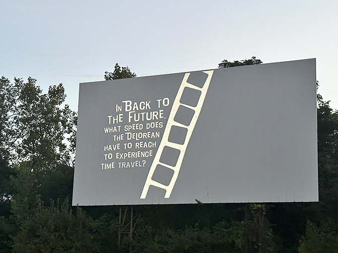 A cinematic trivia question glows in the gloaming—88 mph, for those wondering—as movie buffs settle in for the show.