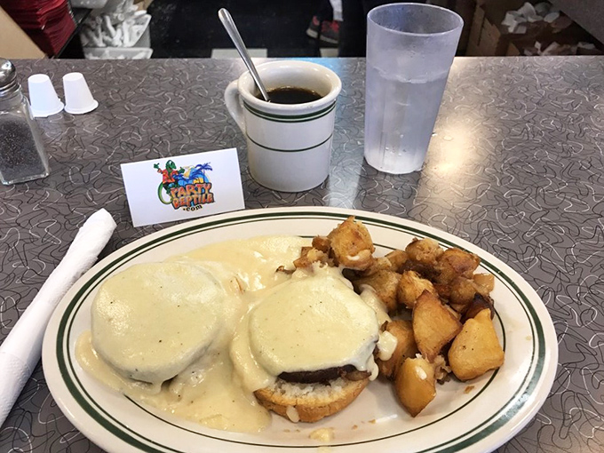 Eggs Benedict with a blanket of hollandaise and perfectly crisp potatoes &ndash; the breakfast that makes you want to high-five the chef and take a nap simultaneously.