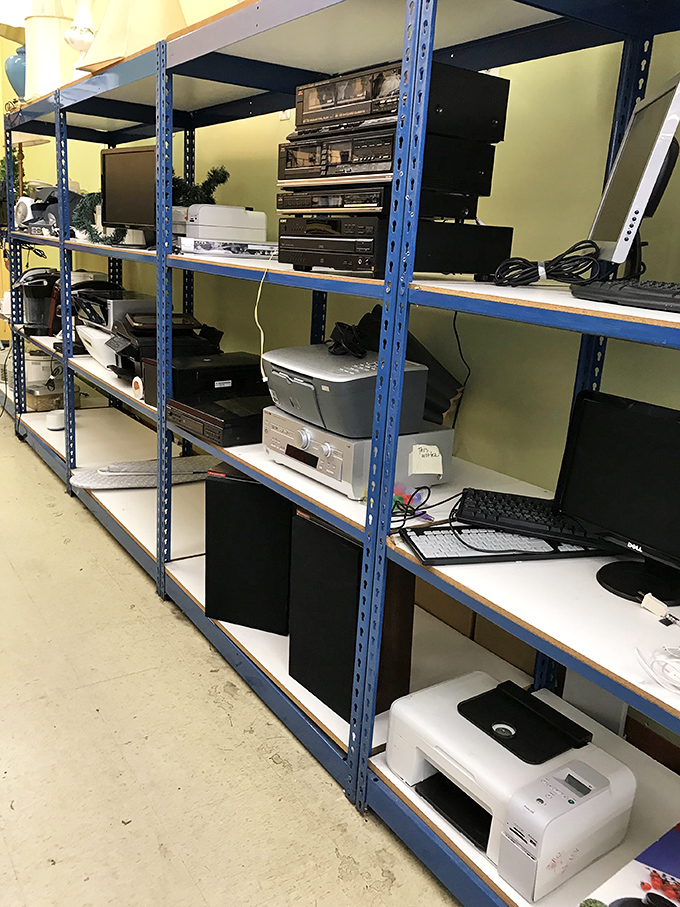 Electronics from every era pile up like a museum of "remember when we used these?"