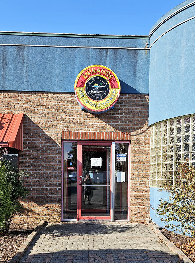 The welcoming entrance and cheerful signage signal that good things await inside this breakfast haven.