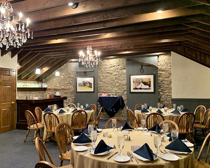 The private dining room balances rustic charm with refined elegance. Those chandeliers have witnessed countless toasts, proposals, and birthday candle wishes.