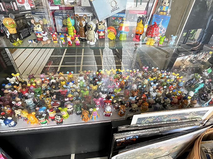 Tiny armies of collectible characters stand at attention behind glass, each figurine representing someone's childhood memories waiting to be rediscovered.
