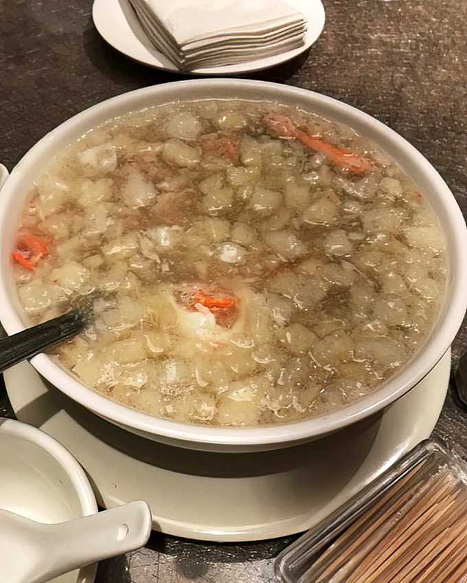 Fish maw soup&mdash;a cloudy constellation of textures and subtle flavors that soothes the soul like a culinary lullaby.