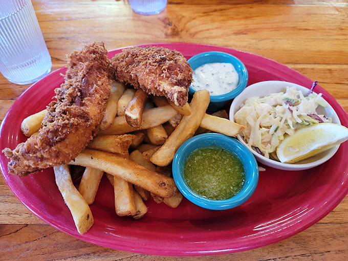 Fish and chips that would make a British pub jealous, with a side of slaw that adds just the right amount of crunch to each bite.