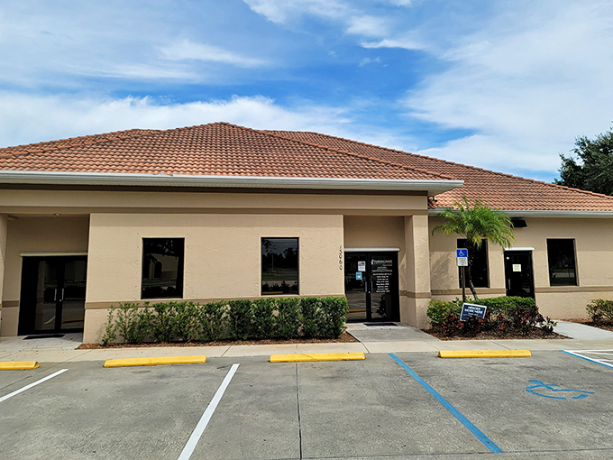 Behind these modest walls, cutting-edge care meets Florida warmth, proving that even medical buildings look better with a palm tree or two.
