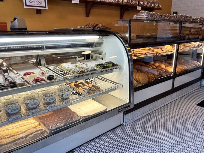 Sweet temptation behind glass. The display case showcases Italian pastries that have been perfecting their act for generations.