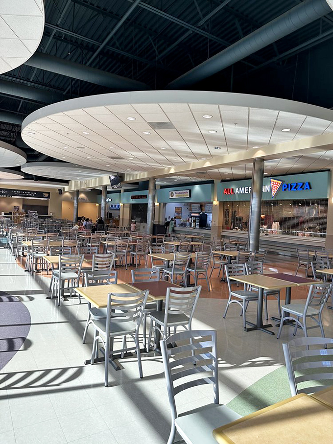 The food court: where shopping warriors refuel before heading back to the retail battlefield. 