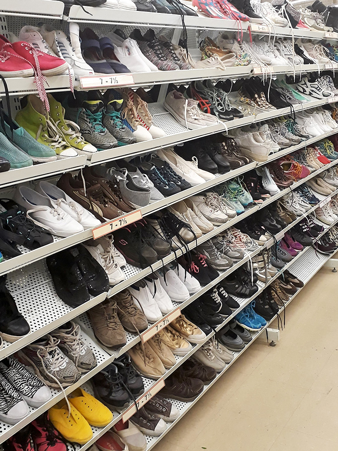 The shoe section: a footwear reunion where barely-worn sneakers mingle with dress shoes that danced at exactly one wedding.