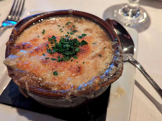 French onion soup that's achieved the perfect cheese-pull-to-broth ratio &ndash; a bubbling cauldron of comfort that's worth every inevitable dry-cleaning bill.
