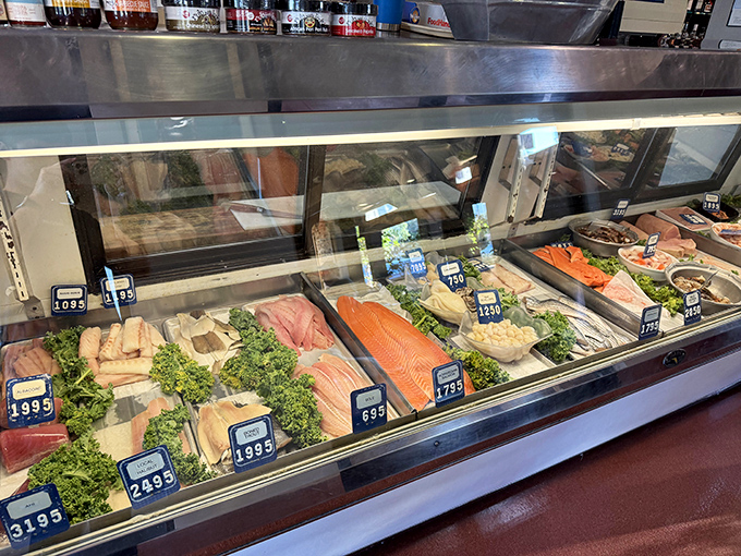 The seafood display case &ndash; where today's catch waits to become tonight's masterpiece. Freshness you can actually see.