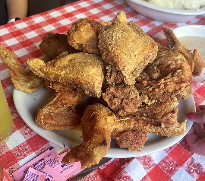 Fried chicken that defines the genre&mdash;golden, crackling crust giving way to juicy meat that makes you understand why people drive for hours to get here.