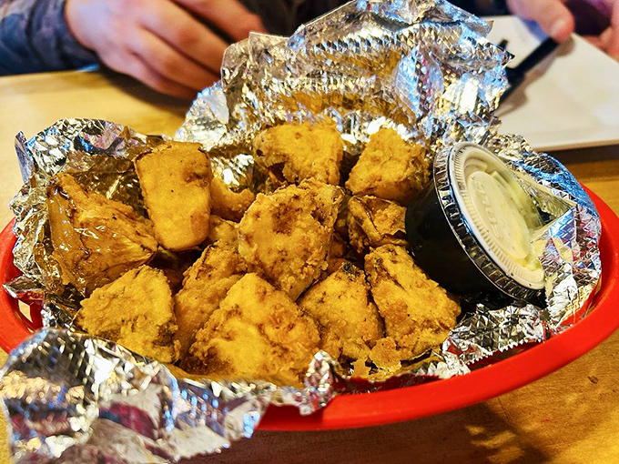 Gator nuggets that would make even Captain Hook reconsider his fear of reptiles. Crispy, tender, and served with a dipping sauce worth bottling.