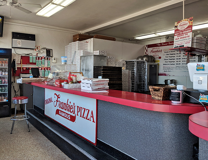 The counter hasn't changed much over the decades &ndash; why mess with perfection when you've mastered the art of Miami pizza?
