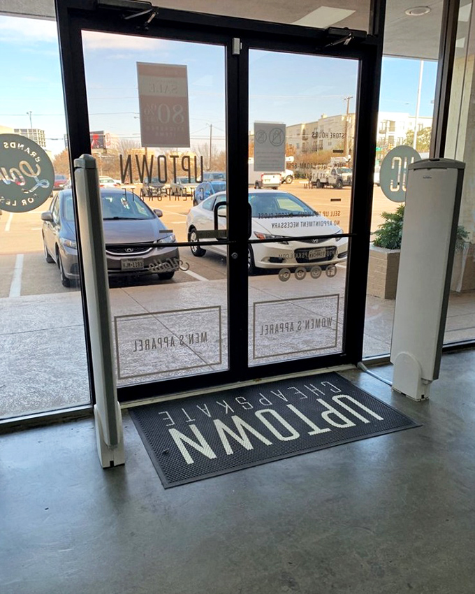 The entrance mat says it all: "Uptown Cheapskate" is where fashion meets frugality in the most delightful union.