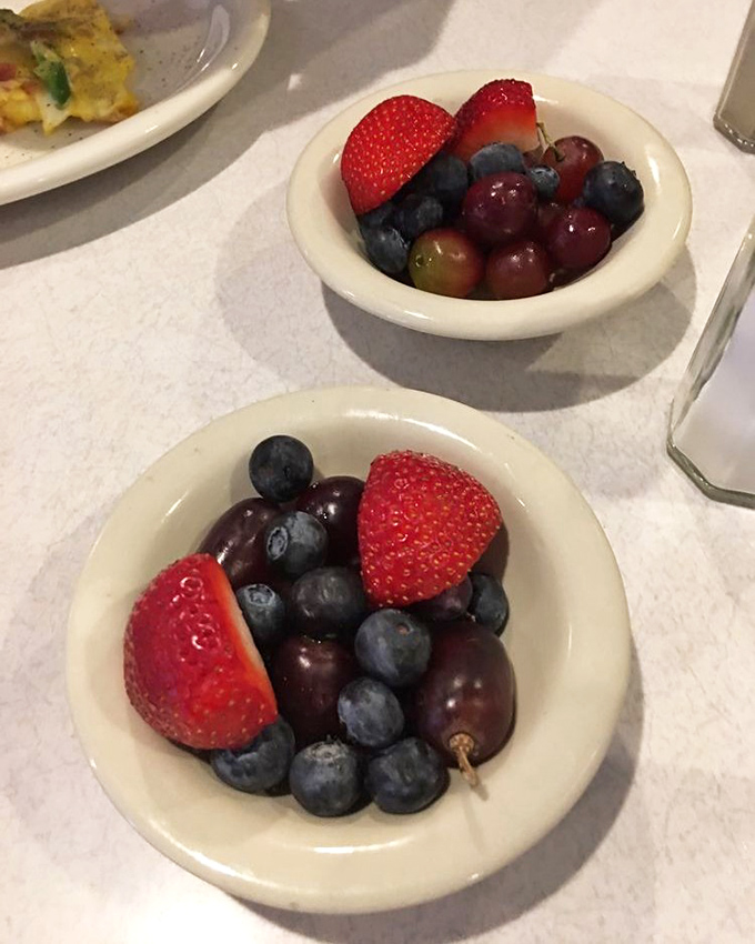 These fruit cups aren't just healthy side options &ndash; they're little bowls of jewel-toned morning optimism nestled against white ceramic.