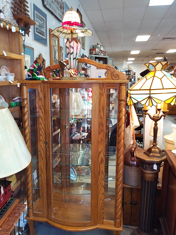 Carved wooden display cabinets that put modern furniture to shame &ndash; craftsmanship from an era when things were built to outlast their makers.