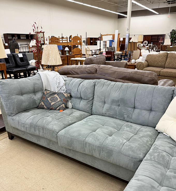 That tufted blue sofa isn't just comfortable&mdash;it's practically begging for Sunday afternoon naps during Bears commercial breaks.