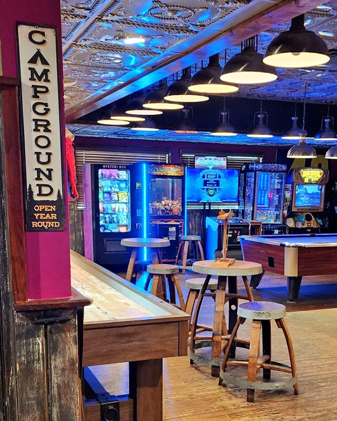 The "Campground" area offers games and glowing blue ambiance – like the coolest summer camp you never attended as a kid.