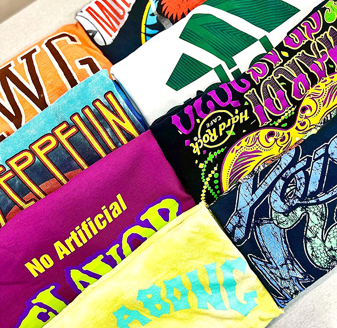 Graphic tees that tell stories without saying a word. Each vibrant design practically screaming "I'm cooler than anything you'll find at the mall."