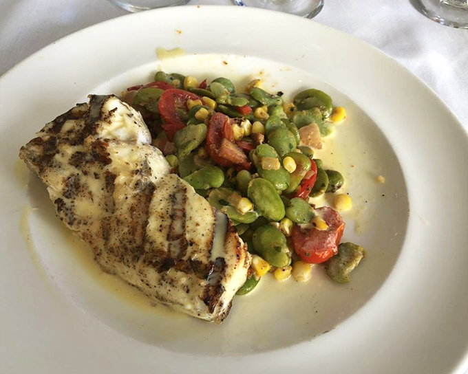 Grilled halibut with colorful vegetables showcases the kitchen's commitment to both flavor and beautiful presentation always.