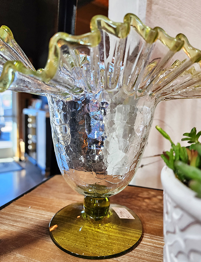 This delicate glass vase with its amber base has outlived several design trends and will probably outlive several more.