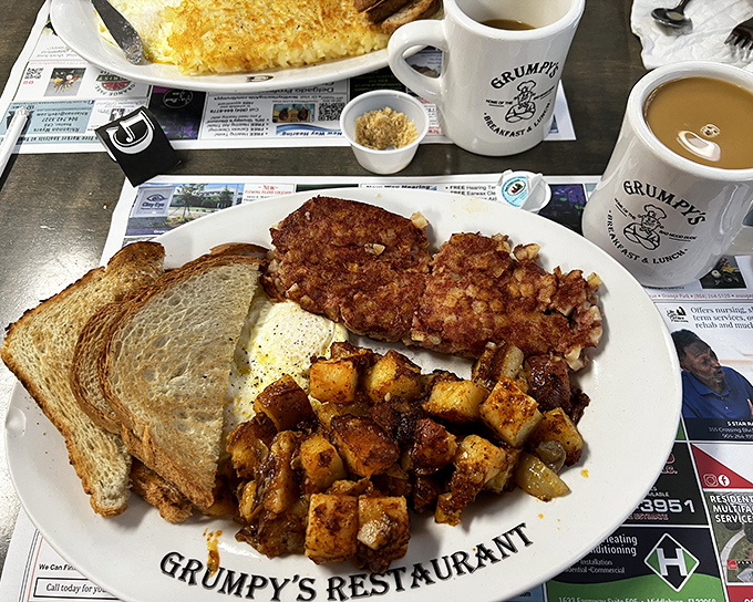 Those home fries look like golden nuggets of crispy potato perfection on newspaper placemats.