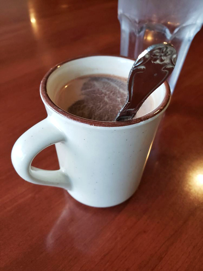 Sometimes the simplest pleasures are the most profound. This humble mug of hot chocolate promises warmth after a blustery beach walk.