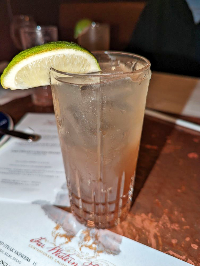 The humble lime wedge transforms a simple drink into a refreshing escape. This isn't just iced tea&mdash;it's liquid air conditioning for Central Coast heat.
