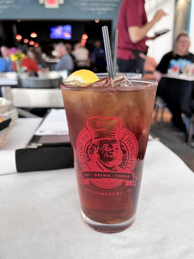 Their signature glass showcases more than just iced tea—it's liquid philosophy with a lemon twist. "Eat, Drink, Think" indeed.