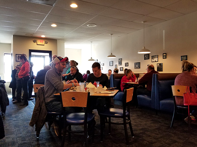 Weekend warriors line up for their breakfast battle fuel, proving that good things come to those willing to wait for waffle perfection.