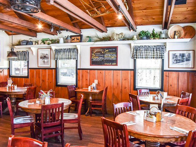 Exposed beams, checkered curtains, and tables that have hosted decades of vacation memories. Nostalgia served with every meal.