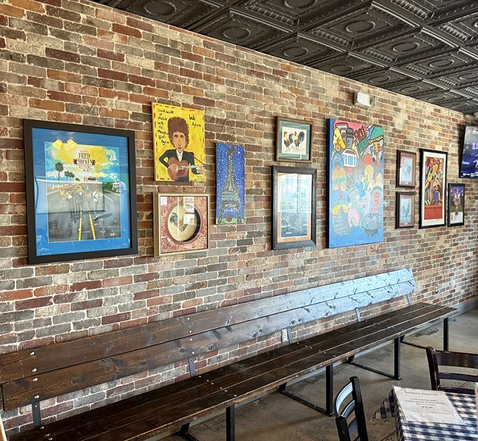 The wall art collection feels like a cool uncle's basement – eclectic, slightly random, and somehow perfectly fitting for a place serving soul-satisfying food.