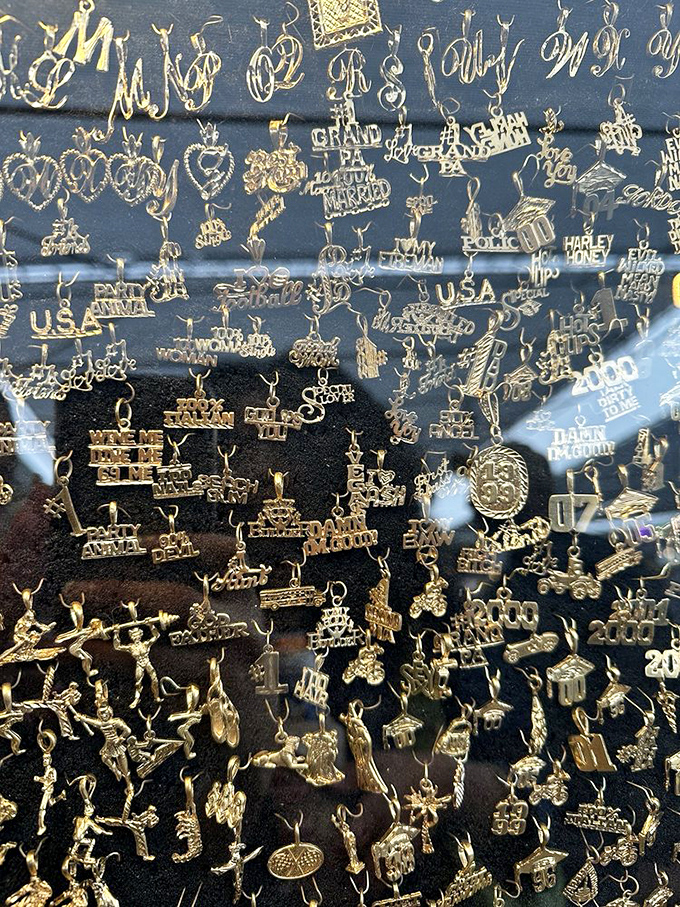 Gold charms galore! This dazzling display of pendants offers something for everyone&mdash;from zodiac signs to declarations of love and everything between.