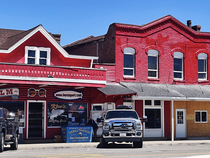 Ken's Sporting Goods' vibrant red building stands out like a cardinal in winter, promising all the gear you need for Sierra adventures.