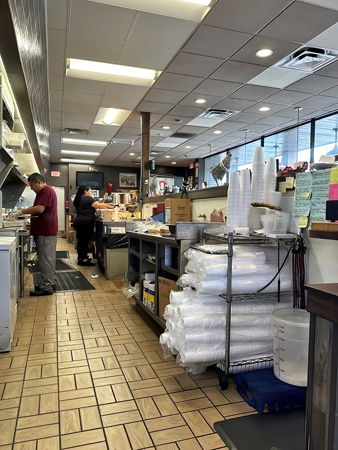 Behind the scenes where breakfast magic happens. Like watching a well-choreographed dance, but with spatulas and biscuit dough.