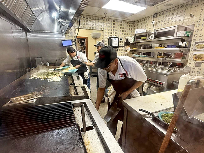 Where the magic happens&mdash;skilled hands transforming simple ingredients into the dishes that have kept Austinites coming back since Eisenhower was president.