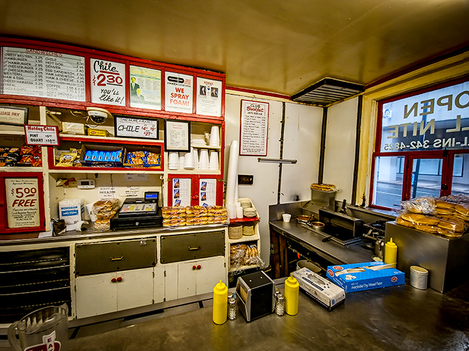 The kitchen ballet—where short-order cooks perform culinary choreography that Gordon Ramsay would applaud but never improve.