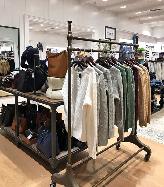 Sweaters and handbags arranged with military precision. Your closet may be chaos, but retail therapy starts with perfect organization.