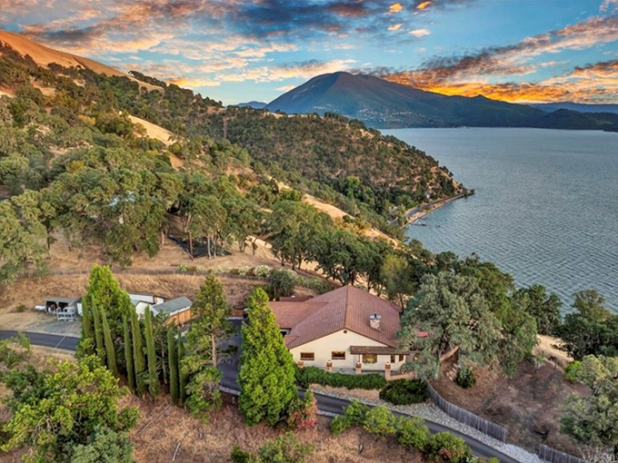 Sunset paints Mount Konocti in golden hues as lakefront properties enjoy the kind of view that usually requires a second mortgage.