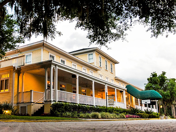 The historic Lakeside Inn's sunny yellow facade and sprawling porches have welcomed visitors since the 1880s, offering rocking chair views that never go out of style.