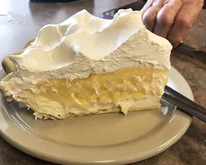 Lemon meringue pie with clouds of meringue so high they need FAA clearance &ndash; sunshine on a plate that brightens even the gloomiest day.