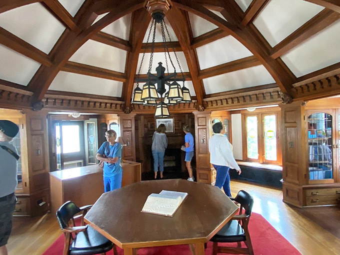 The octagonal library room, where important decisions were made&mdash;like which leather-bound classic to read next.